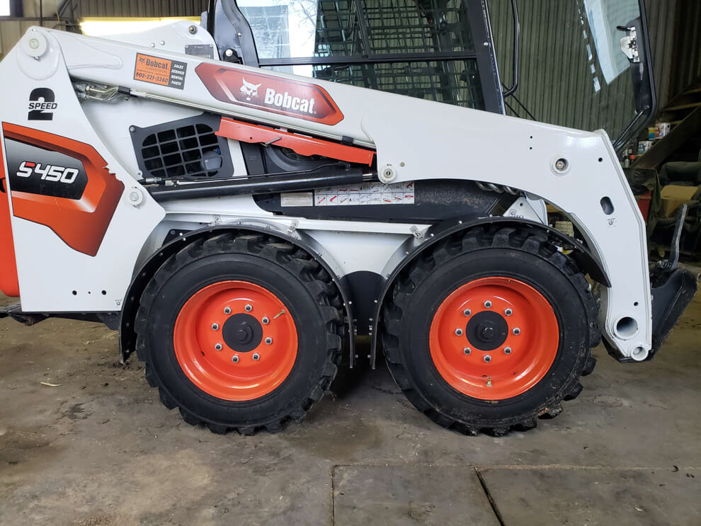 Bobcat Fenders | D-Fender | De Forest, WI | Custom Fenders for Skid Loaders