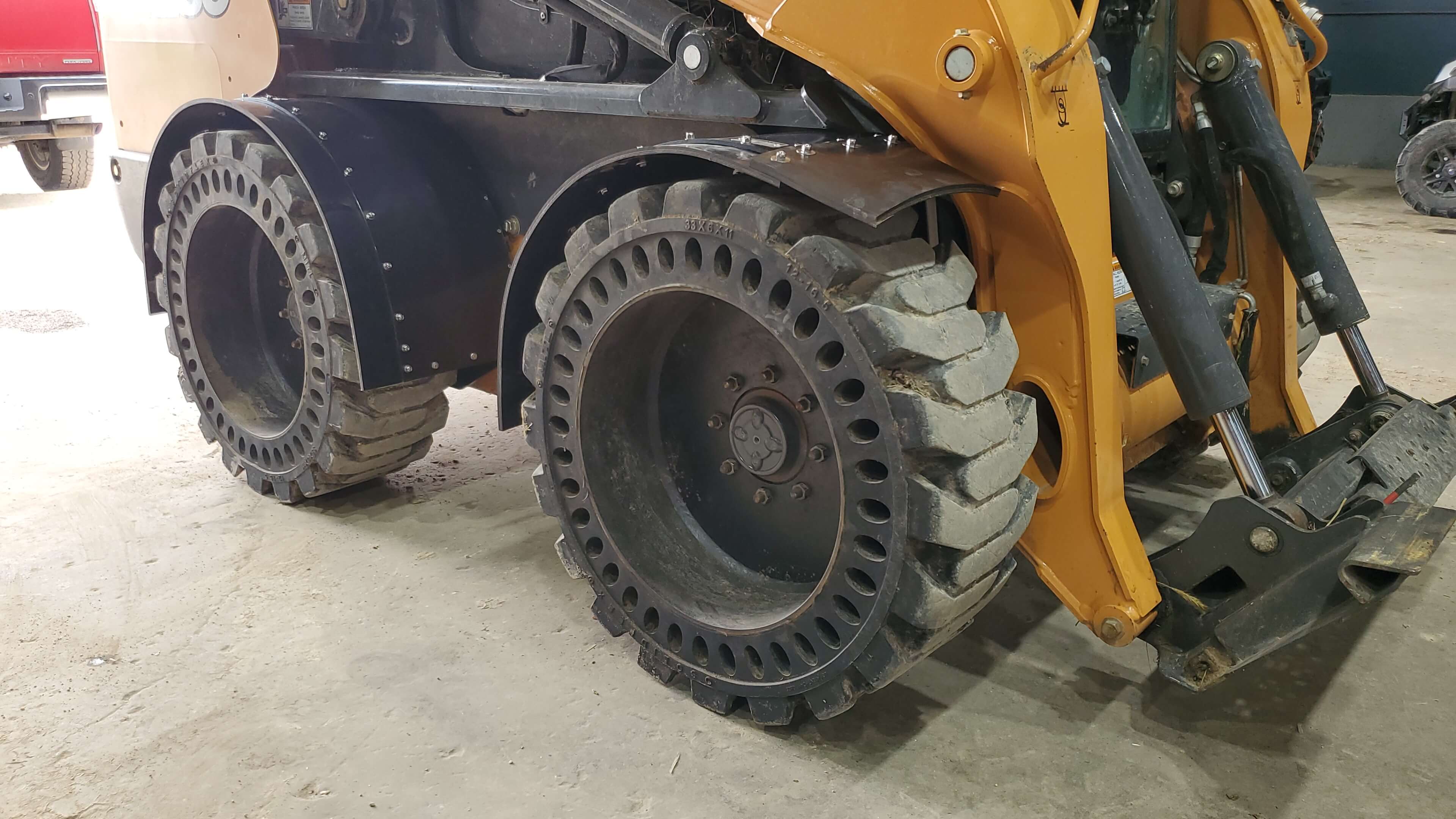Case Fenders | D-Fender | De Forest, WI | Custom Fenders for Skid Loaders