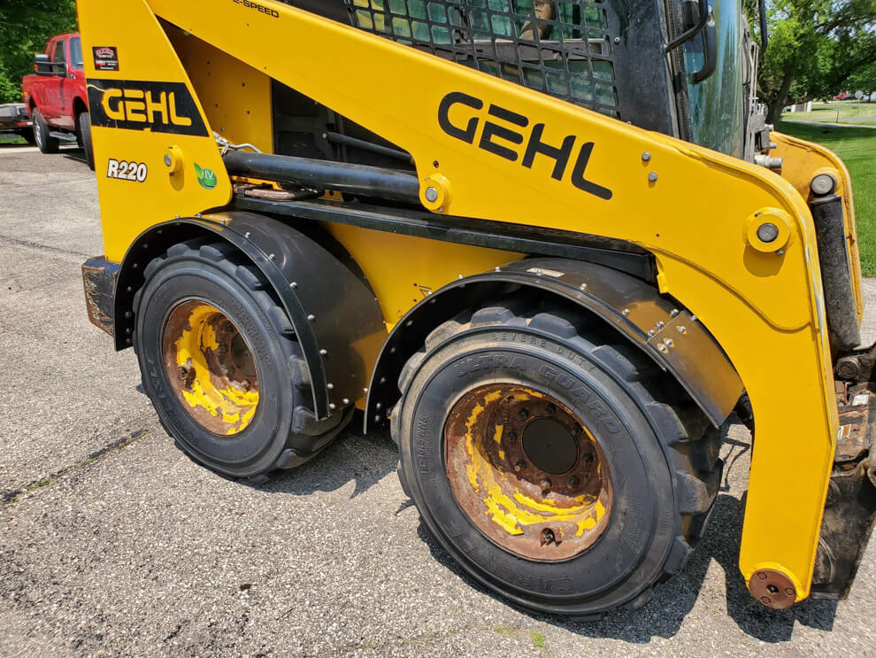 Gehl Fenders | D-Fender | De Forest, WI | Custom Fenders for Skid Loaders