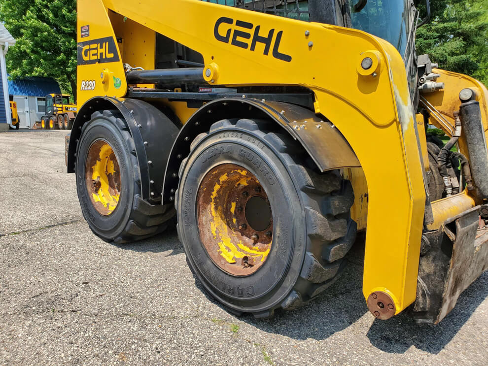 Gehl Fenders | D-Fender | De Forest, WI | Custom Fenders for Skid Loaders