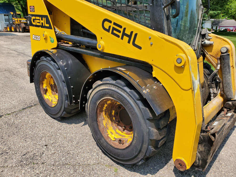 Gehl Fenders | D-Fender | De Forest, WI | Custom Fenders for Skid Loaders