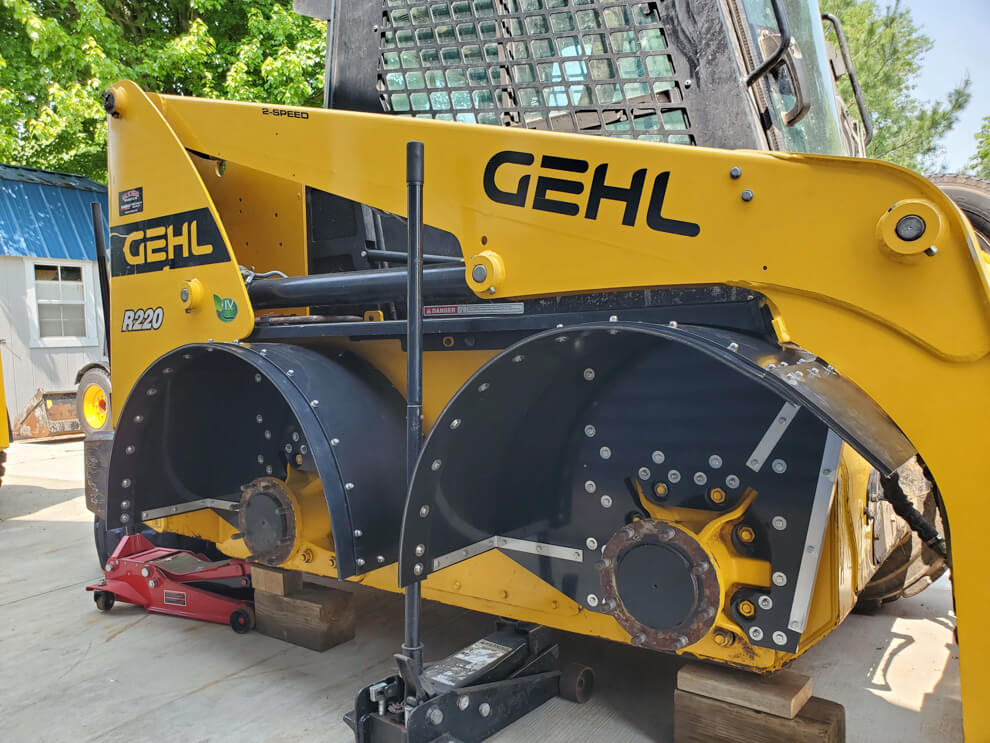 Gehl Fenders | D-Fender | De Forest, WI | Custom Fenders for Skid Loaders