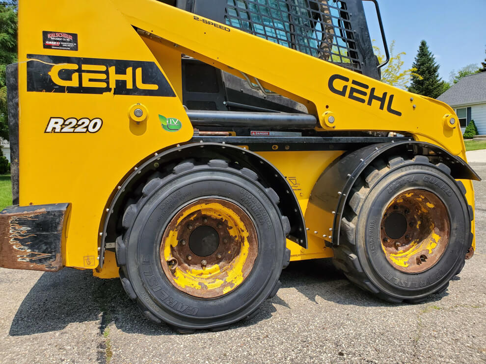 Gehl Fenders | D-Fender | De Forest, WI | Custom Fenders for Skid Loaders