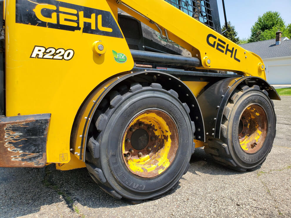 Gehl Fenders | D-Fender | De Forest, WI | Custom Fenders for Skid Loaders