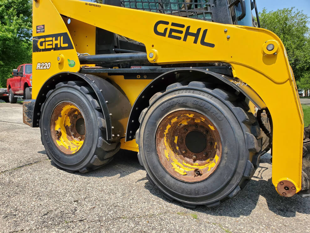 Gehl Fenders | D-Fender | De Forest, WI | Custom Fenders for Skid Loaders